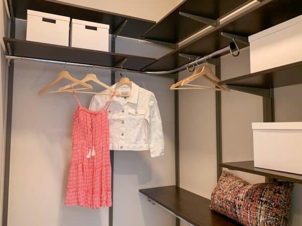 Adjustable Closet Shelving in a Walk-In Closet by Closets Las Vegas